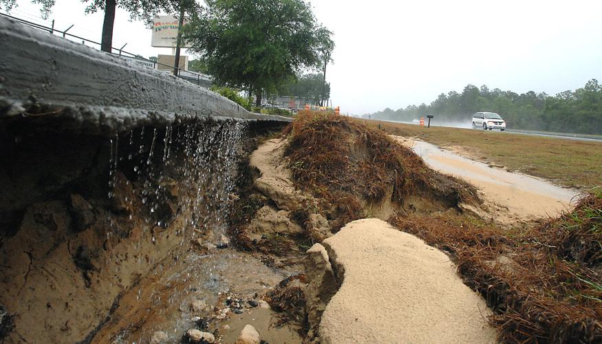 25-year storm floods roadways, washes away sidewalks | Local News ...