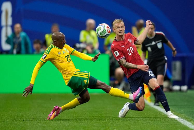South Africa keeps its World Cup hopes alive with a 1-1 draw against ...