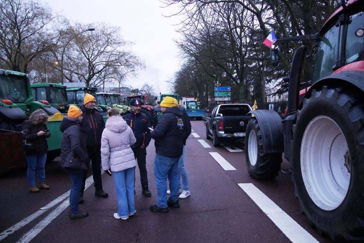 Farmers drive tractors through Paris and block highways in Greece to ...