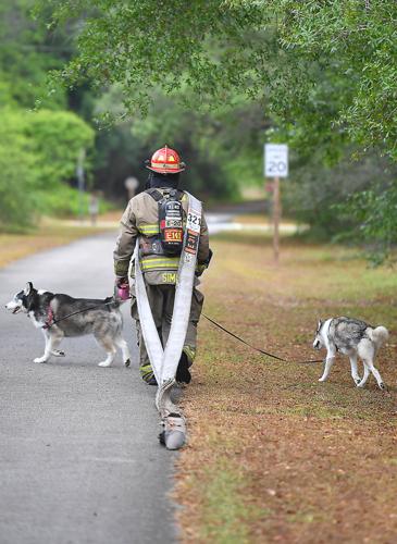 Fireman to raise money for church youth group by dragging fire hose 26. ...