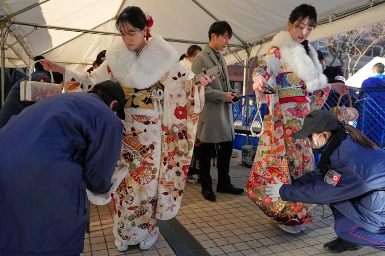 Photos of 20-year-olds at a Coming of Age Day ceremony in Japan ...