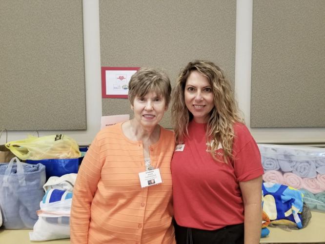 Women of the World Club wraps up its year with charity donations ...