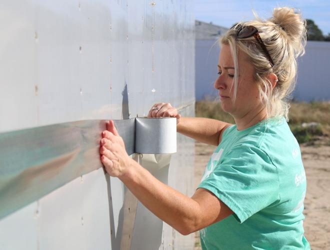 A home for the holidays: Habitat mom, sons move into new home | Local ...