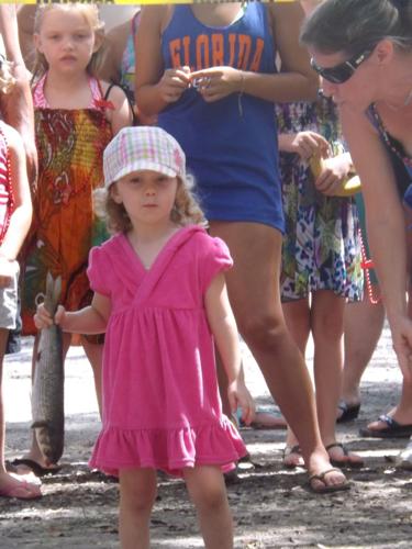 Kids get chummy for charity at mullet toss | Local News ...