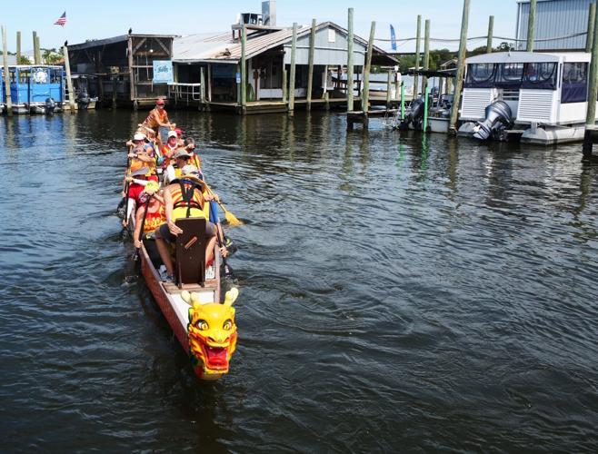 Off we row, into the mild blue waters. ‘Dragon’ our boat, it’s mighty ...