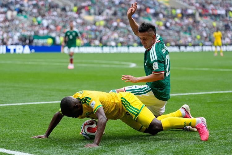 Mexico gets off to roaring World Cup start with a 2-0 win over South ...