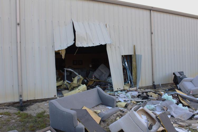 Update: Pickup truck hauling camper crashes through Lecanto furniture ...