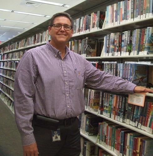 For love of books, community: Library Director Eric Head enters his ...