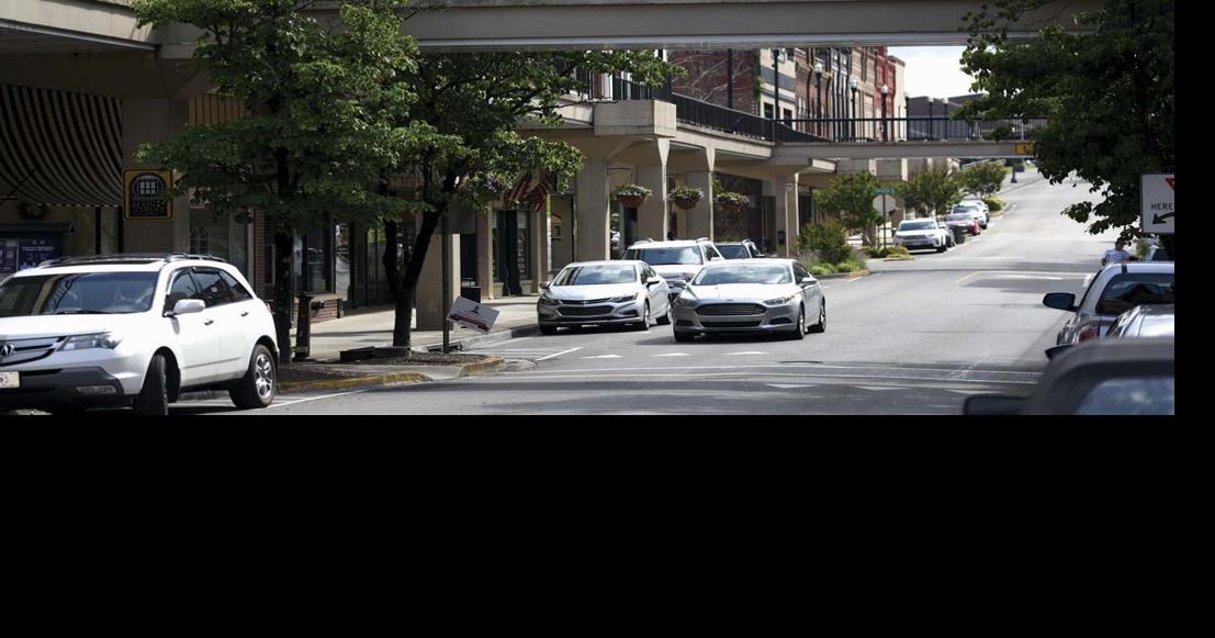 Crossroads Downtown Partnership Executive Director Katie Ragan steps ...