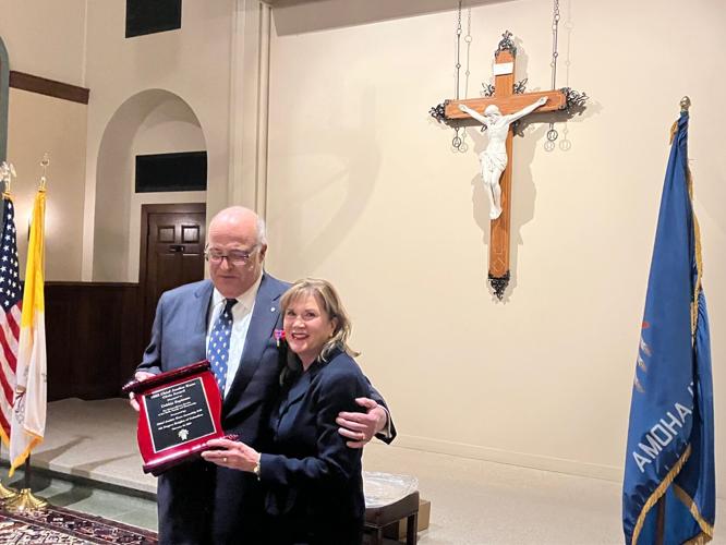 Debbie Epinosa of Oklahoma City and Deacon Larry Sousa of Norman ...