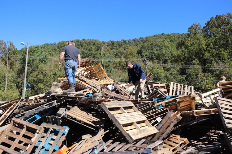 Skyhawks rally to rebuild historic bonfire destroyed by ‘prank’ | News ...