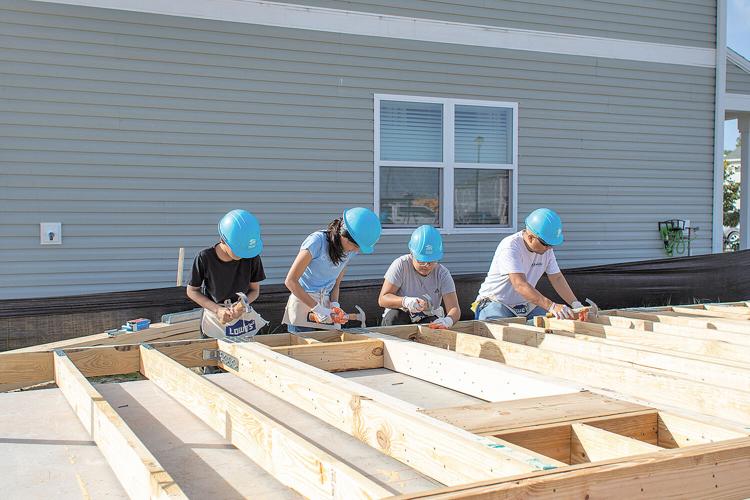 Raising Walls in Naples | Clubs & Organizations | coastalbreezenews.com