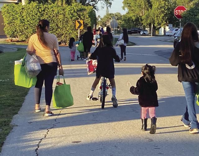 Feliz Navidad for Marco Lake Drive Families | Community ...