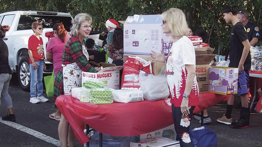 Feliz Navidad for Marco Lake Drive Families | Community ...