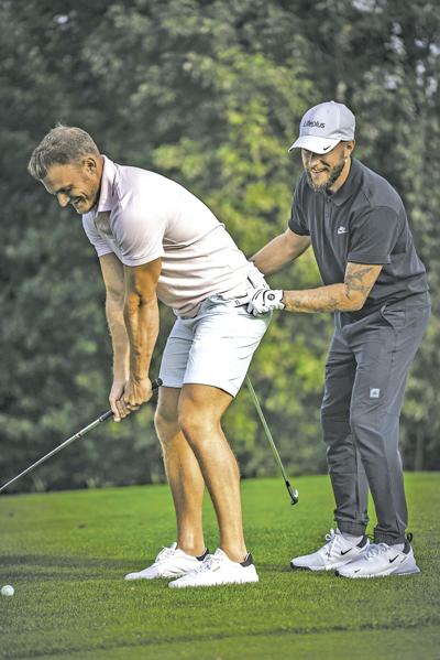 Taking Golf lessons | Sports | coastalbreezenews.com