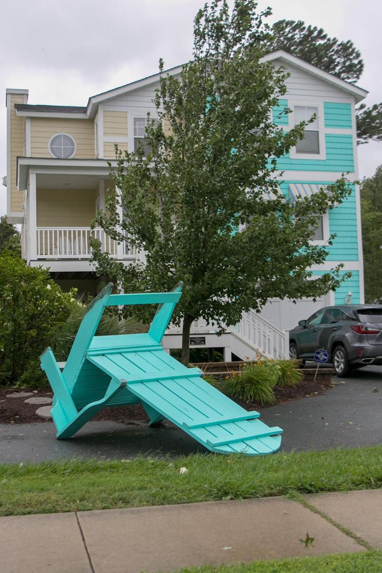 Volunteer efforts return iconic chair to Justin’s Beach House ...