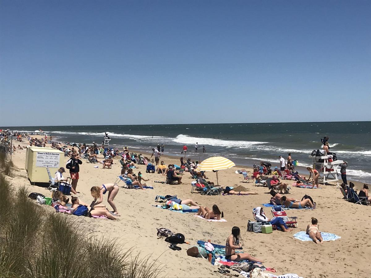 Beachgoers begin returning to Bethany | Point Pics | coastalpoint.com