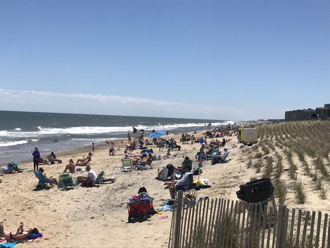 Beachgoers begin returning to Bethany | Point Pics | coastalpoint.com