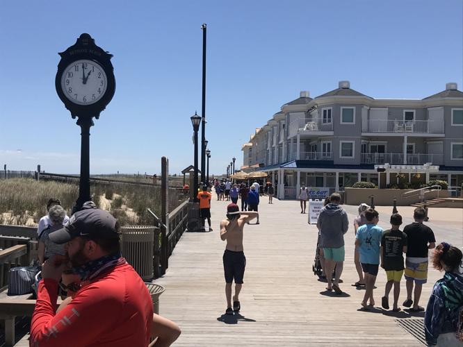 Beachgoers begin returning to Bethany | Point Pics | coastalpoint.com