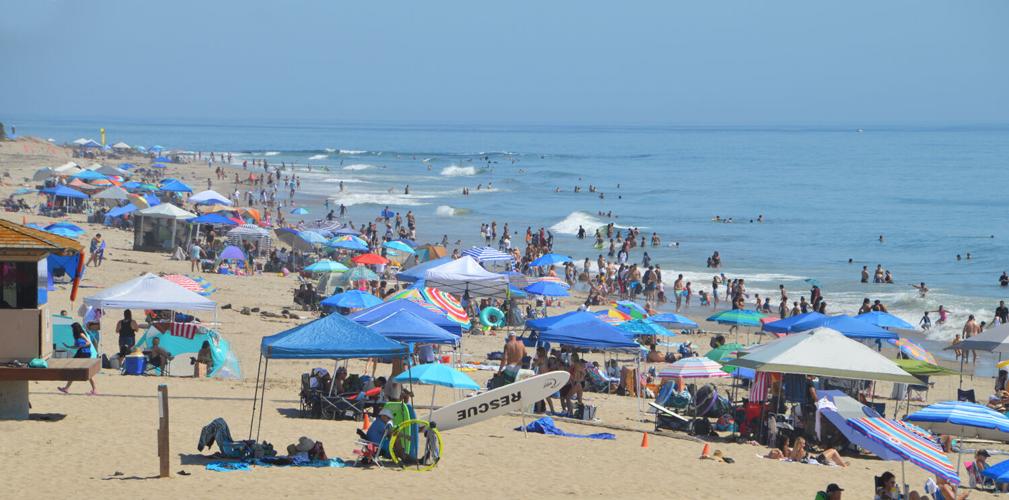 Sweltering heat draws hundreds to local beaches | News | coastalview.com