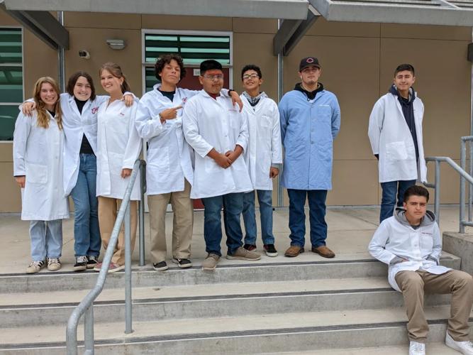 Agilent Tech donates lab coats to CHS science dept. | News ...