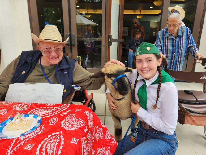 GranVida seniors visit with 4-H goats and lambs | News | coastalview.com