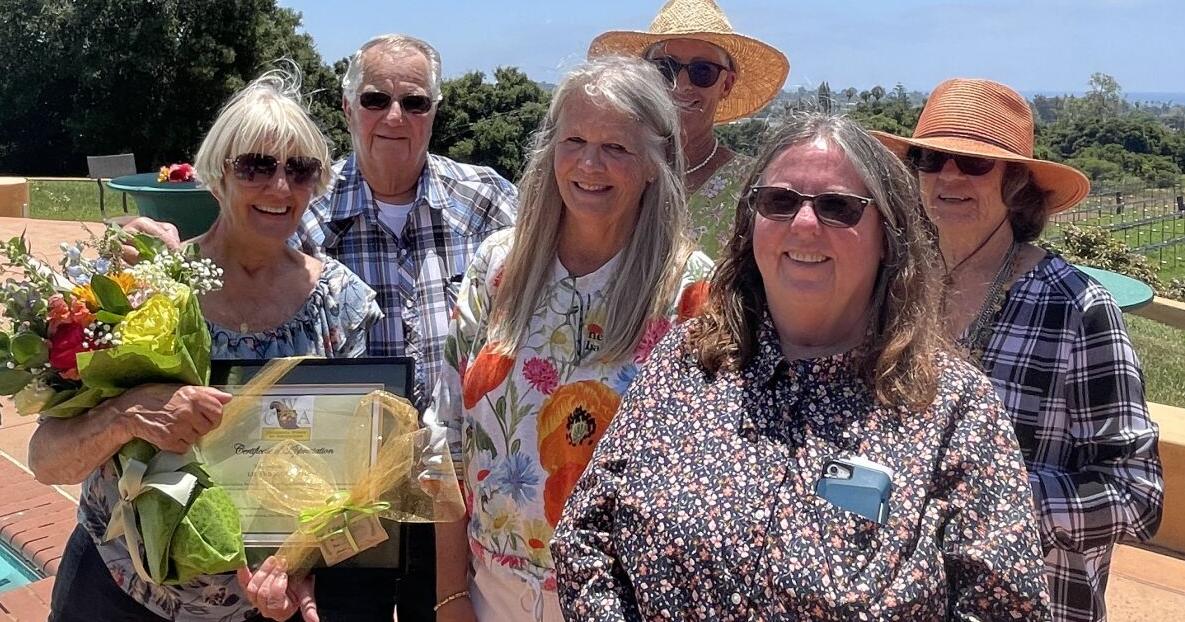 CWA recognizes Liz and John Watkins | News | coastalview.com