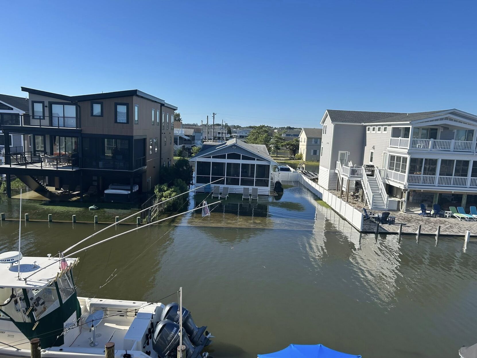 Bayside flooding lingers in Fenwick Island, swimming restrictions in ...