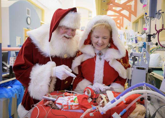 Photo Gallery: NICU babies get a special visit from Santa and Mrs ...