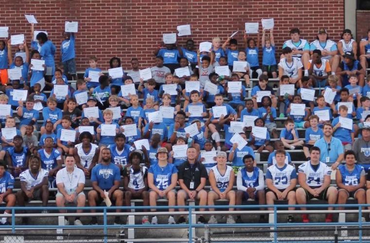 Airport High School's football camp, mom's clinic draws over 250 ...