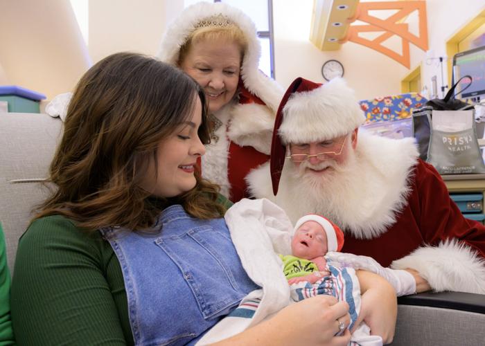 Photo Gallery: NICU babies get a special visit from Santa and Mrs ...