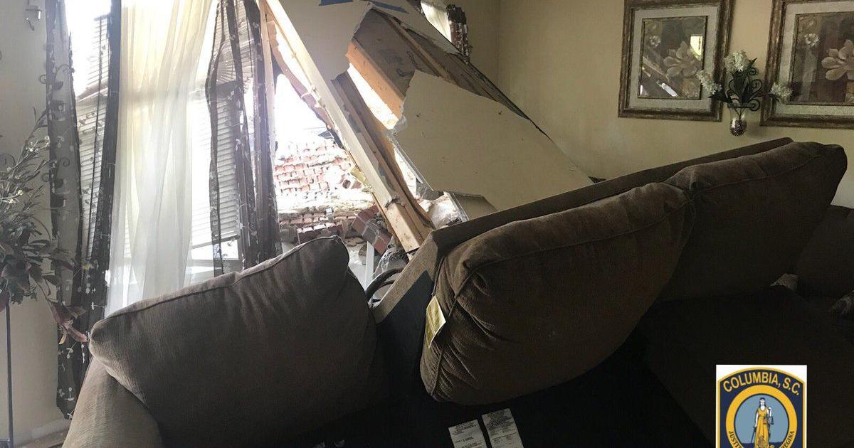 Car crashes into house, hits man on couch | Archive | coladaily.com