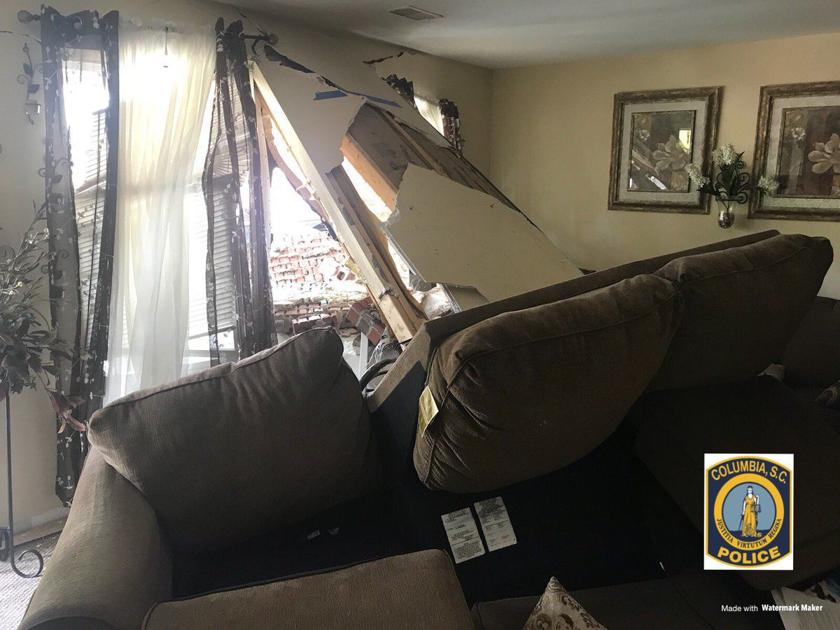 Car crashes into house, hits man on couch | Archive | coladaily.com