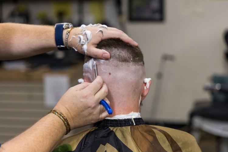 Carolina Barber Shop moves to Main St. after 87 years in Five Points ...