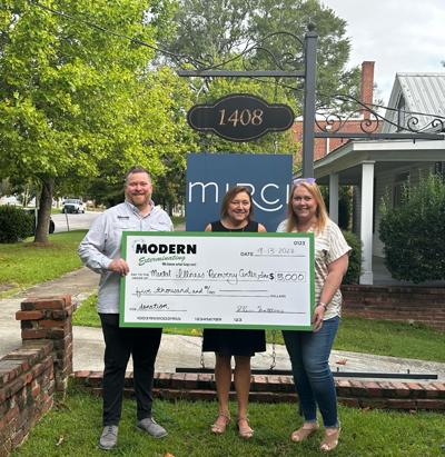 Modern Exterminating Company donates $5K to local charity | Business ...