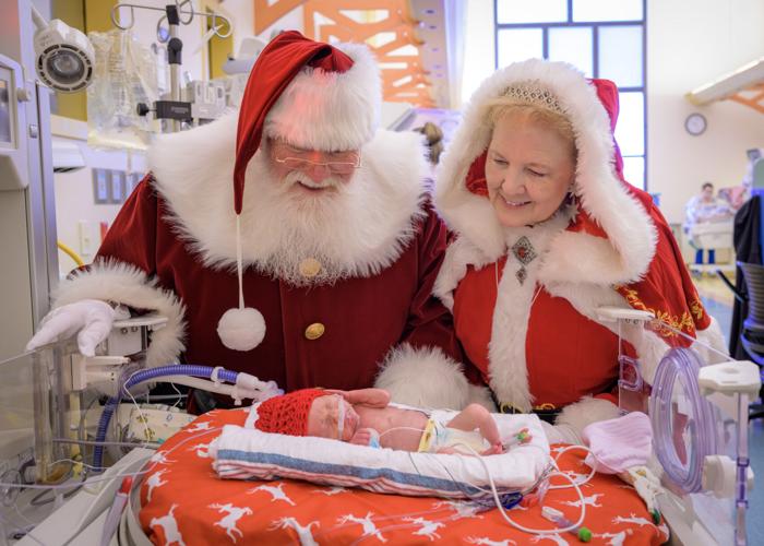 Photo Gallery: NICU babies get a special visit from Santa and Mrs ...