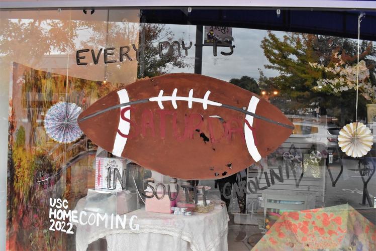 Store windows were painted by USC students in honor of homecoming week ...