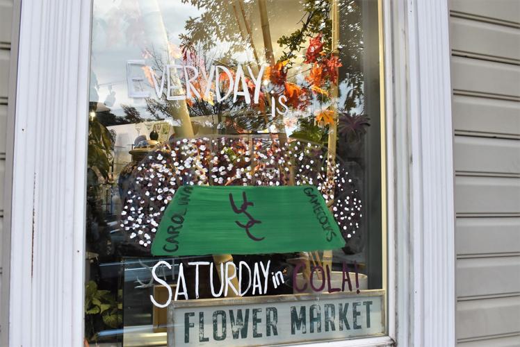 Store windows were painted by USC students in honor of homecoming week ...