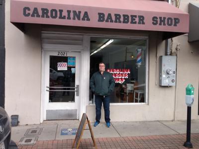 Long-standing Columbia barber shop under new ownership after more than ...