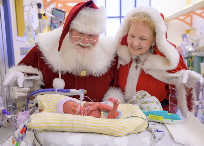 Photo Gallery: NICU babies get a special visit from Santa and Mrs ...