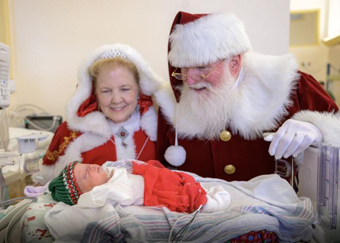 Photo Gallery: NICU babies get a special visit from Santa and Mrs ...