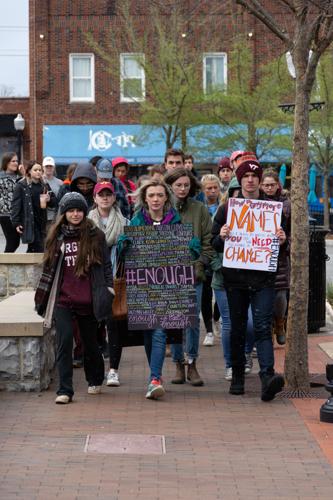 Virginia Tech students protest gun violence at campus walkout event ...
