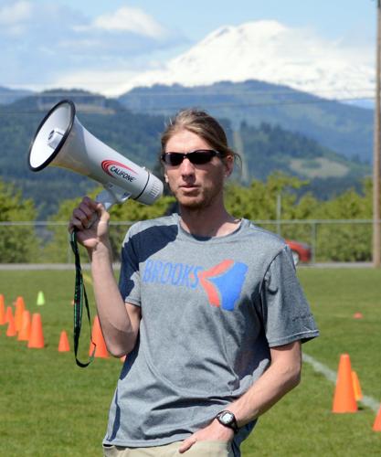 Running the show: Brandon Bertram named head track and field coach for ...
