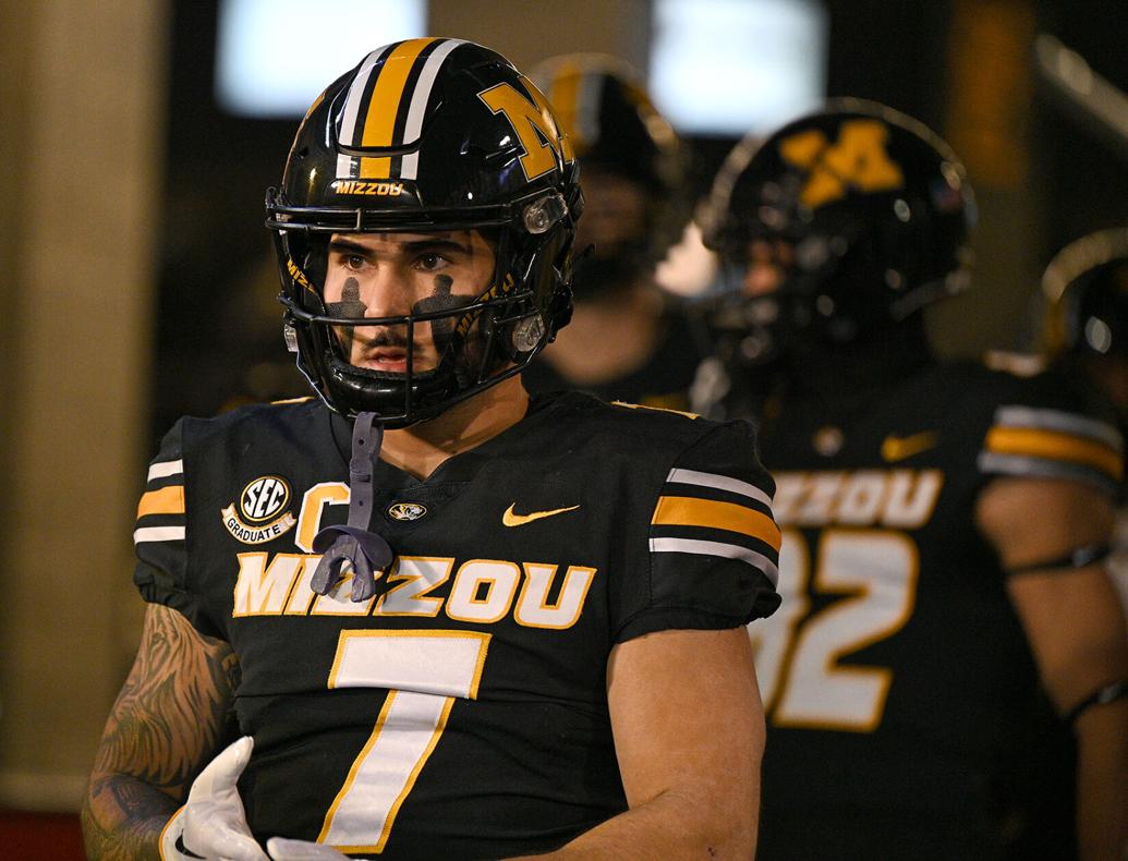 Mizzou running back Cody Schrader prepares to run onto the field ...