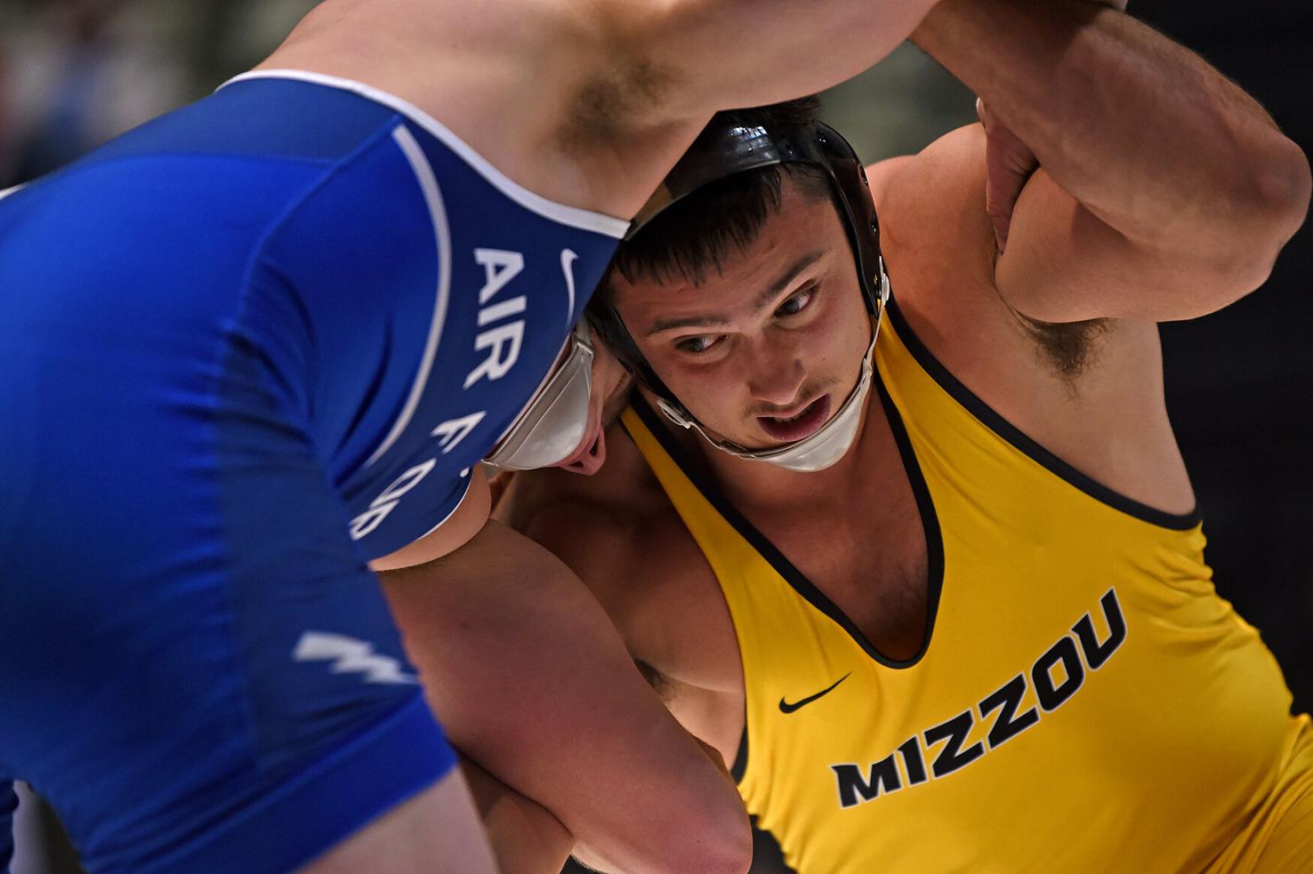 Mizzou wrestler Zach Elam grasps opponent Cole Forrester | Photos ...