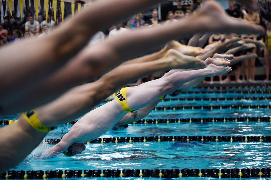 Swim team shaves off time — and hair | Mizzou Sports ...