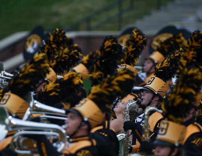 Marching to the beat: High school bands face off at Champion of ...