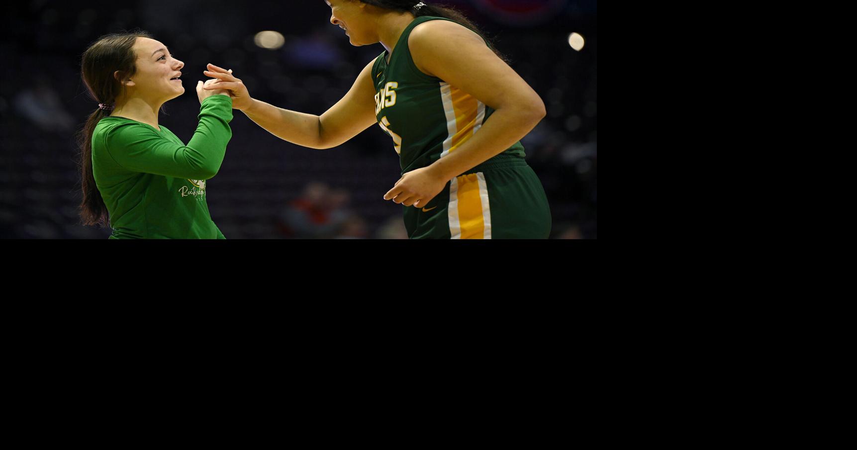 Rock Bridge guard Kate Volmert, left, high-fives Bruins center Jayda ...