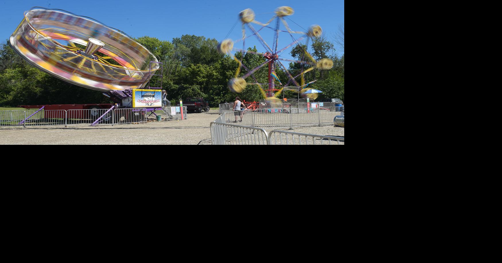 Spinning carnival rides run in the mid-afternoon | News ...