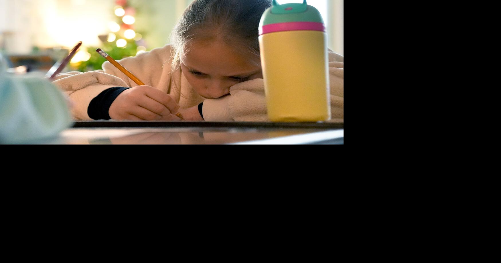 Kinsley Truex, 9, practices writing cursive | News | columbiamissourian.com